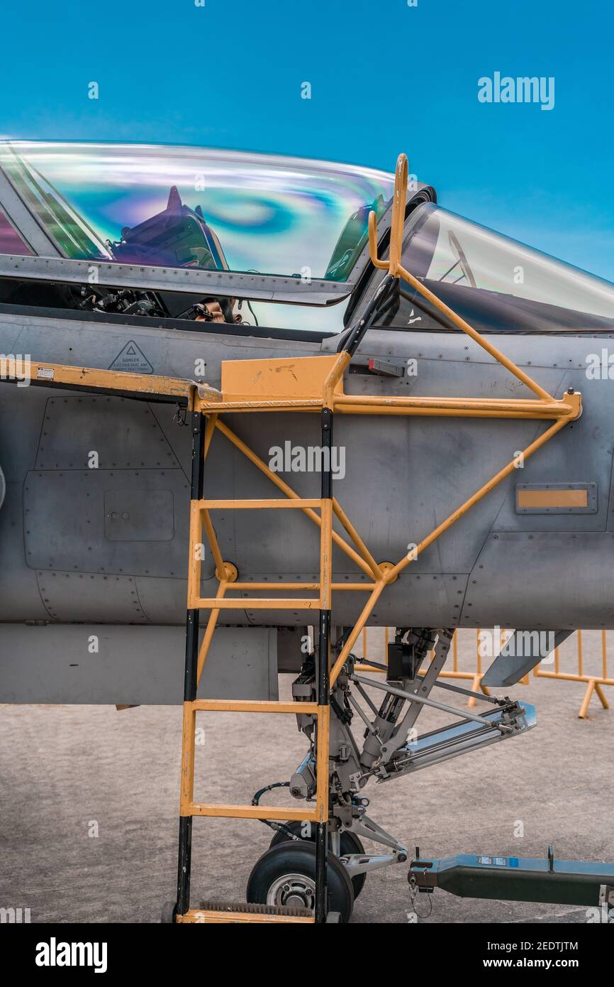 Cockpit of a powerful gray-colored military fighter jet against the ...