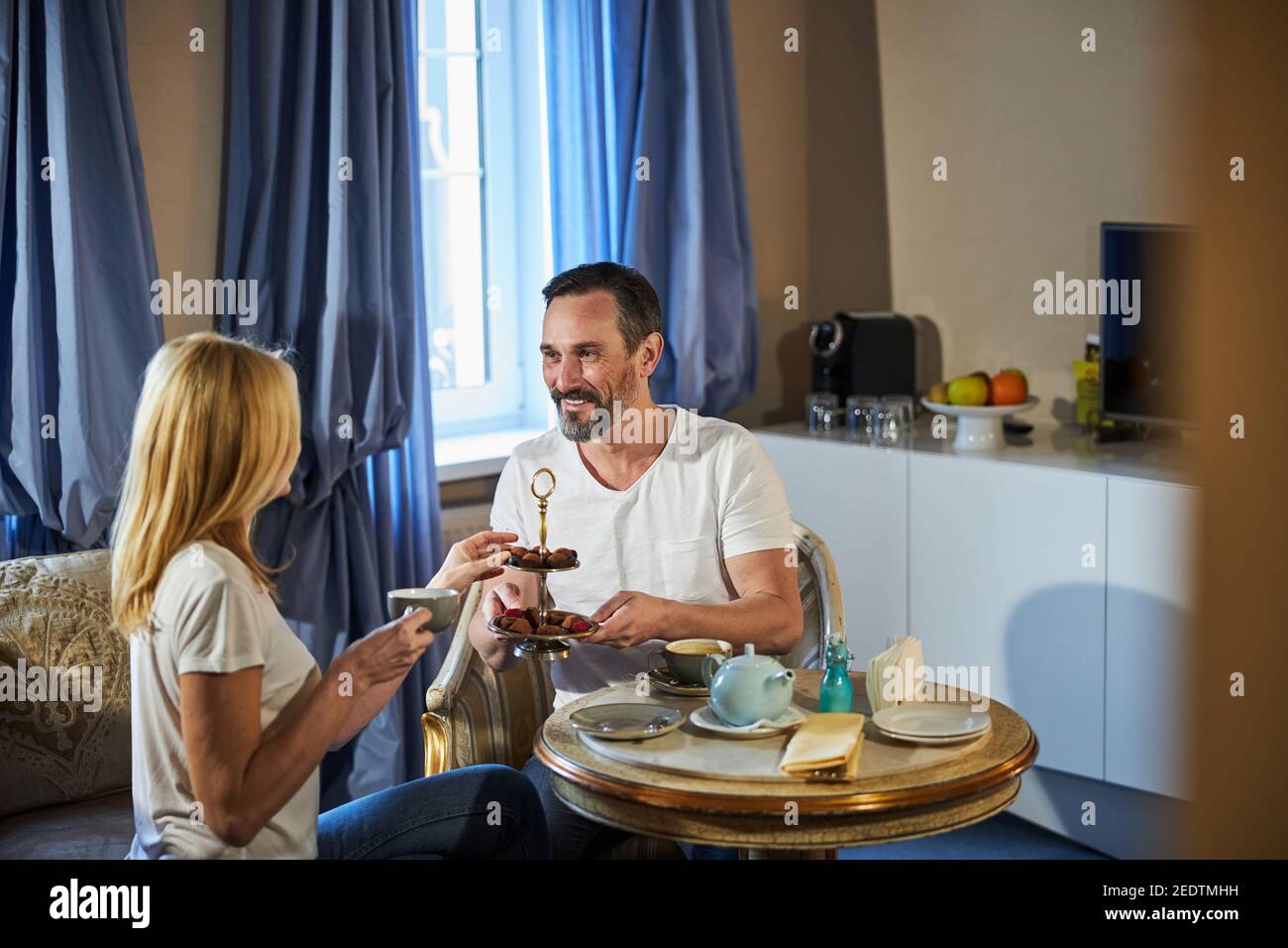 Having tea together hi-res stock photography and images - Alamy