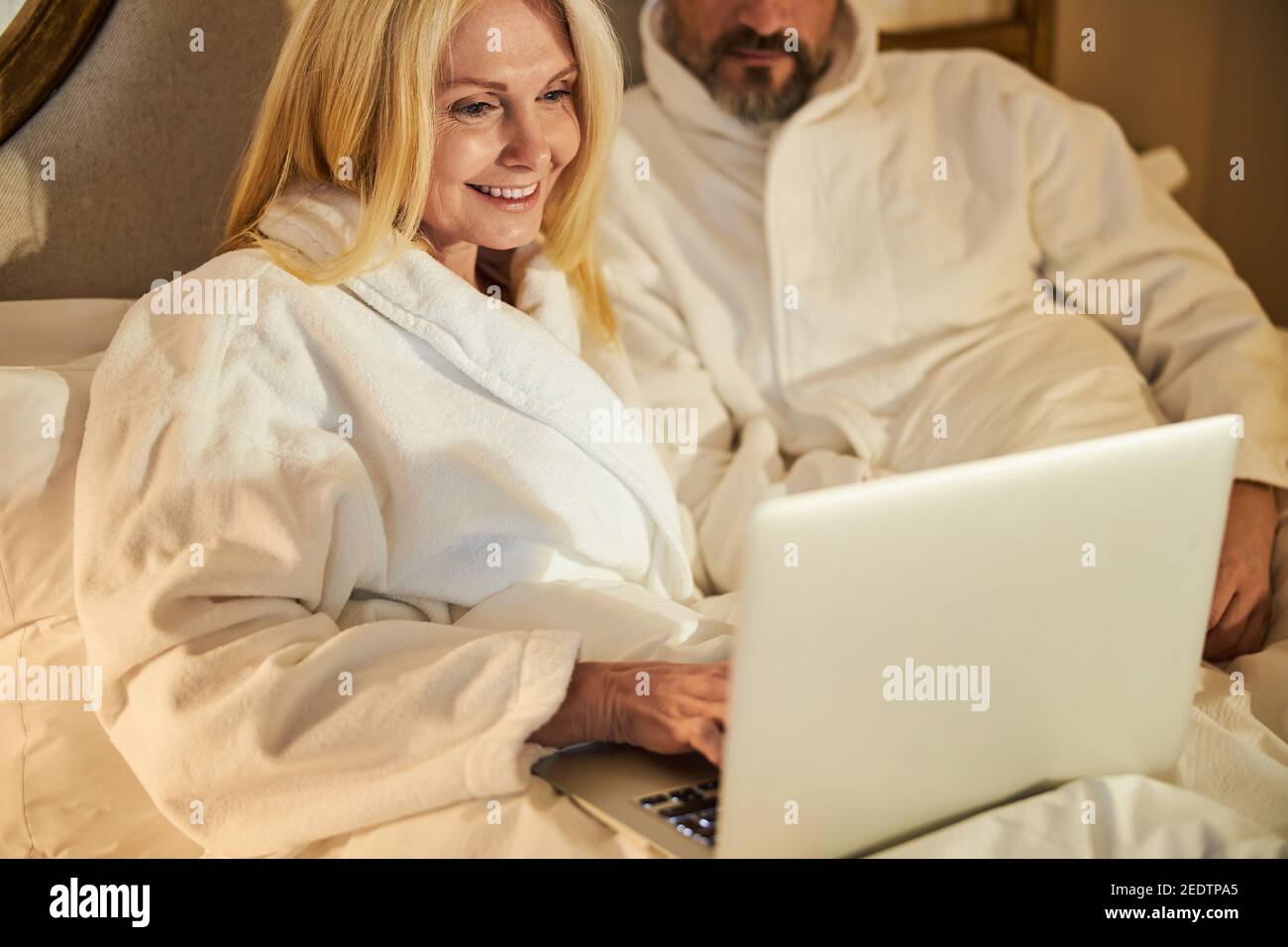 Lazy time in bed with a beloved person Stock Photo - Alamy