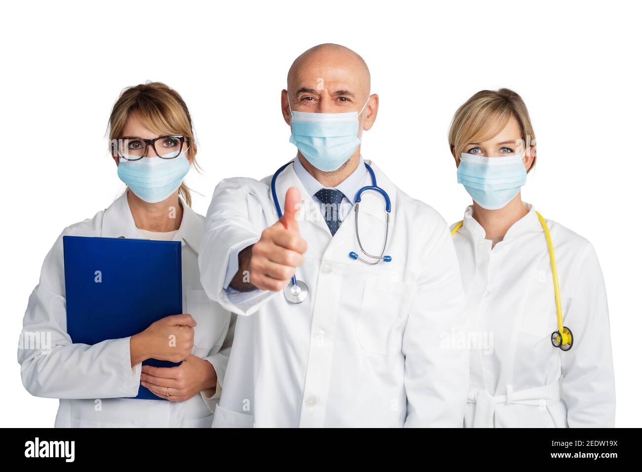 Shot of female and male doctors standing together at isolated white ...
