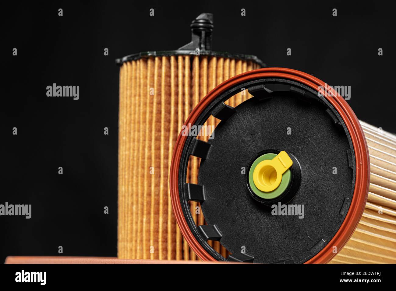 Car engine filter on dark background, close up Stock Photo - Alamy