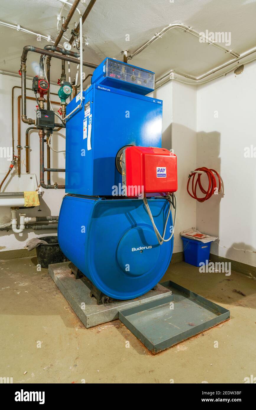 Old blue Buderus G 105 oil heating boiler with red Ray burner ...