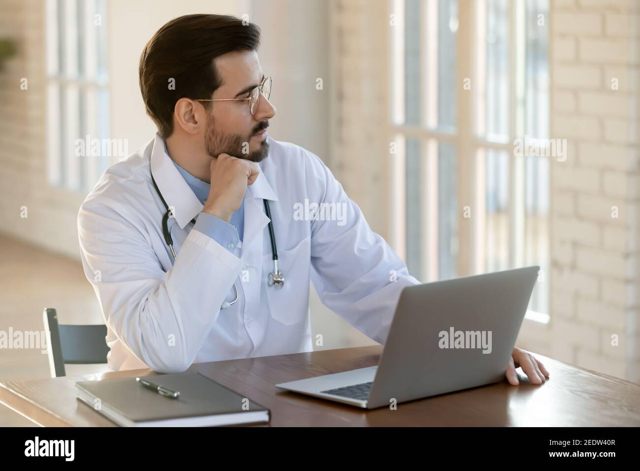 Confident male practitioner in hi-res stock photography and images - Alamy