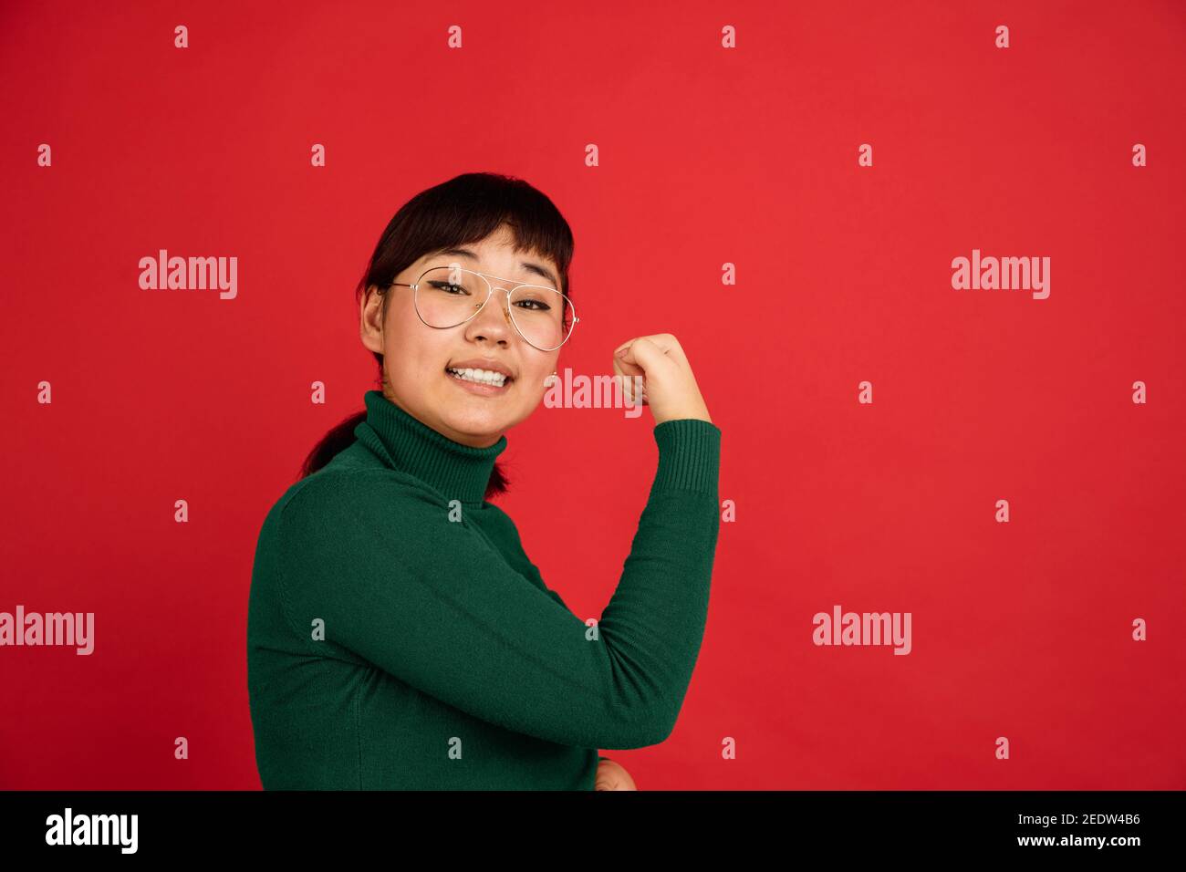 Strong, powerful, cheerful. East asian young beautiful woman's portrait ...