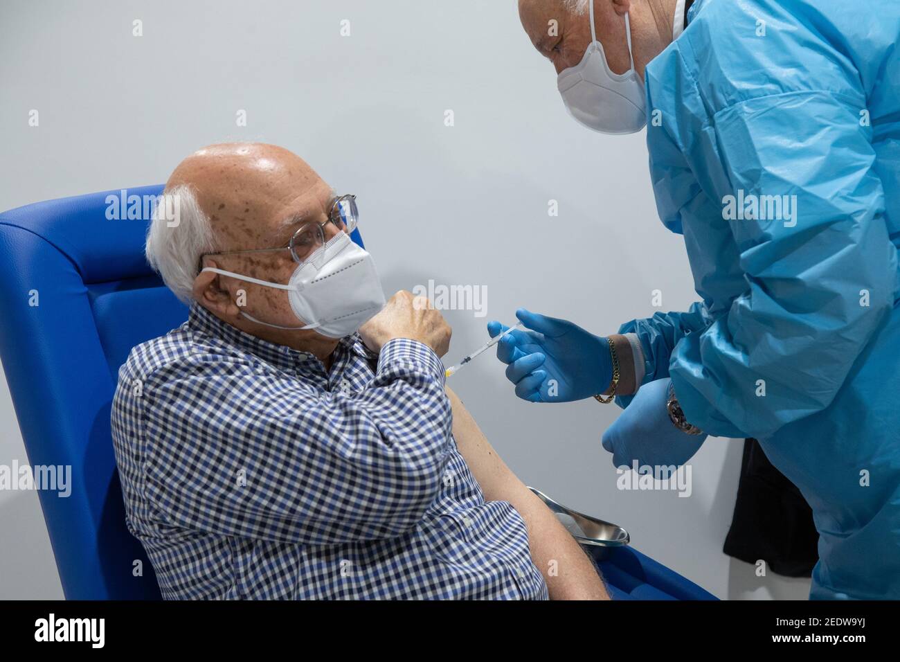 Rome, Italy. 15th Feb, 2021. A nurse vaccinates a patient over 80 in ...