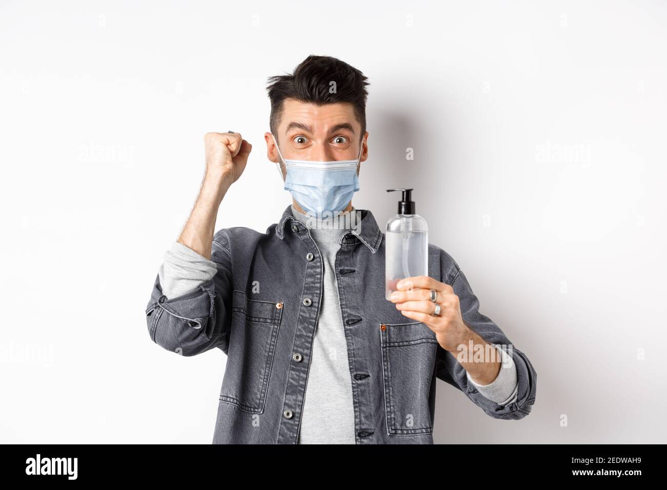 Health, covid and pandemic concept. Happy guy motivated to get rid from ...