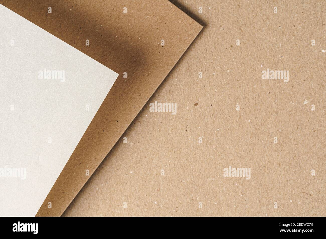 Brown recycled carton paper sheets close up Stock Photo - Alamy