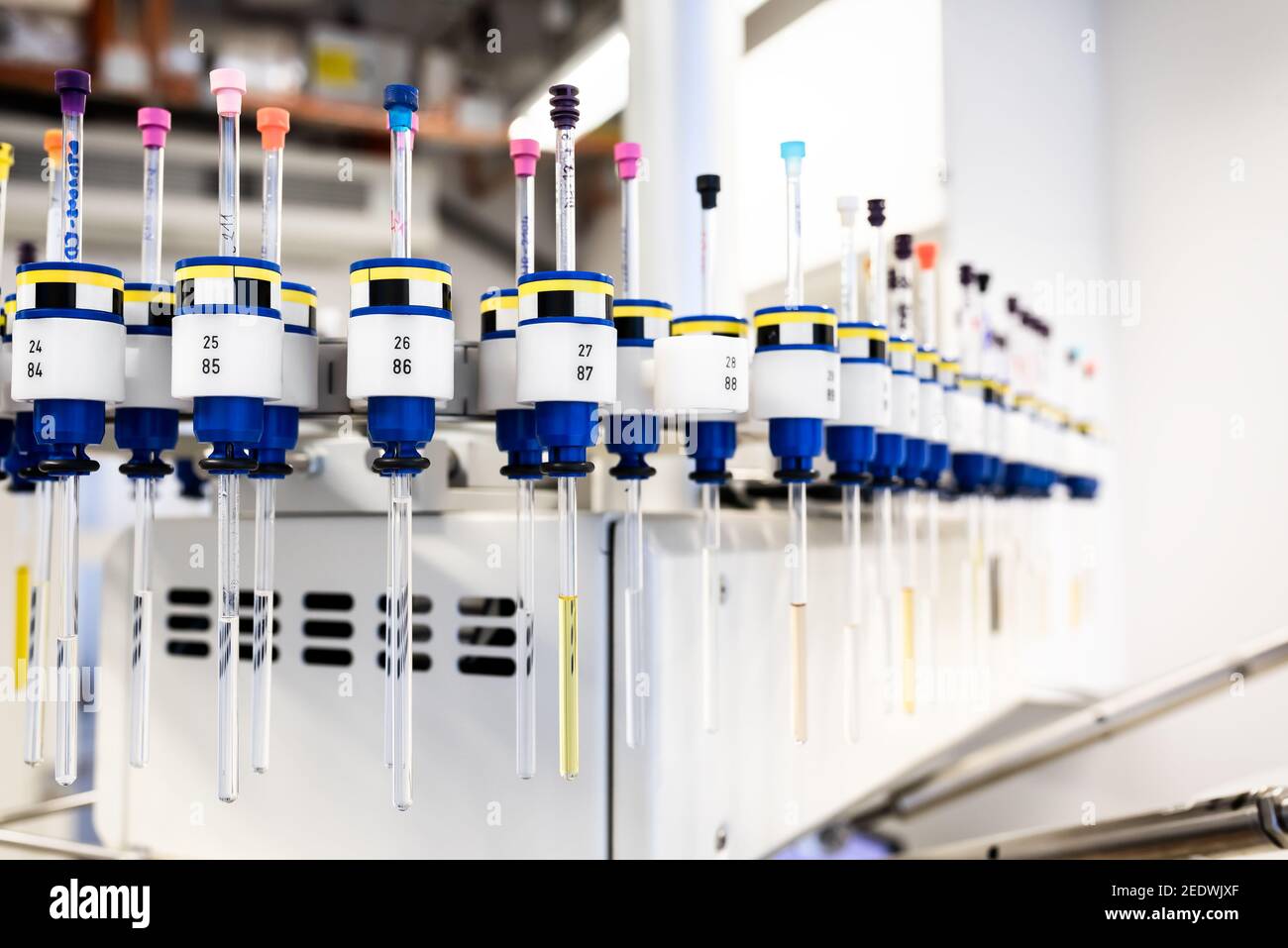 Autosampler of NMR spectrometer loaded with samples for analysis ...