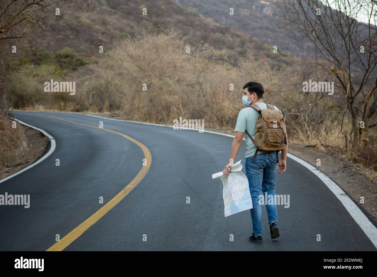 Male traveler backpack maps hi-res stock photography and images - Alamy