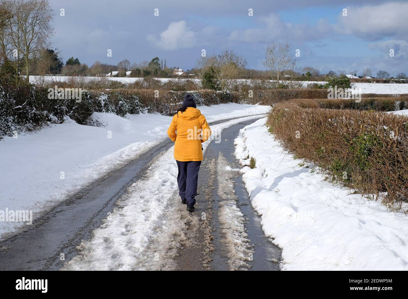 Female snow walking hi-res stock photography and images - Alamy