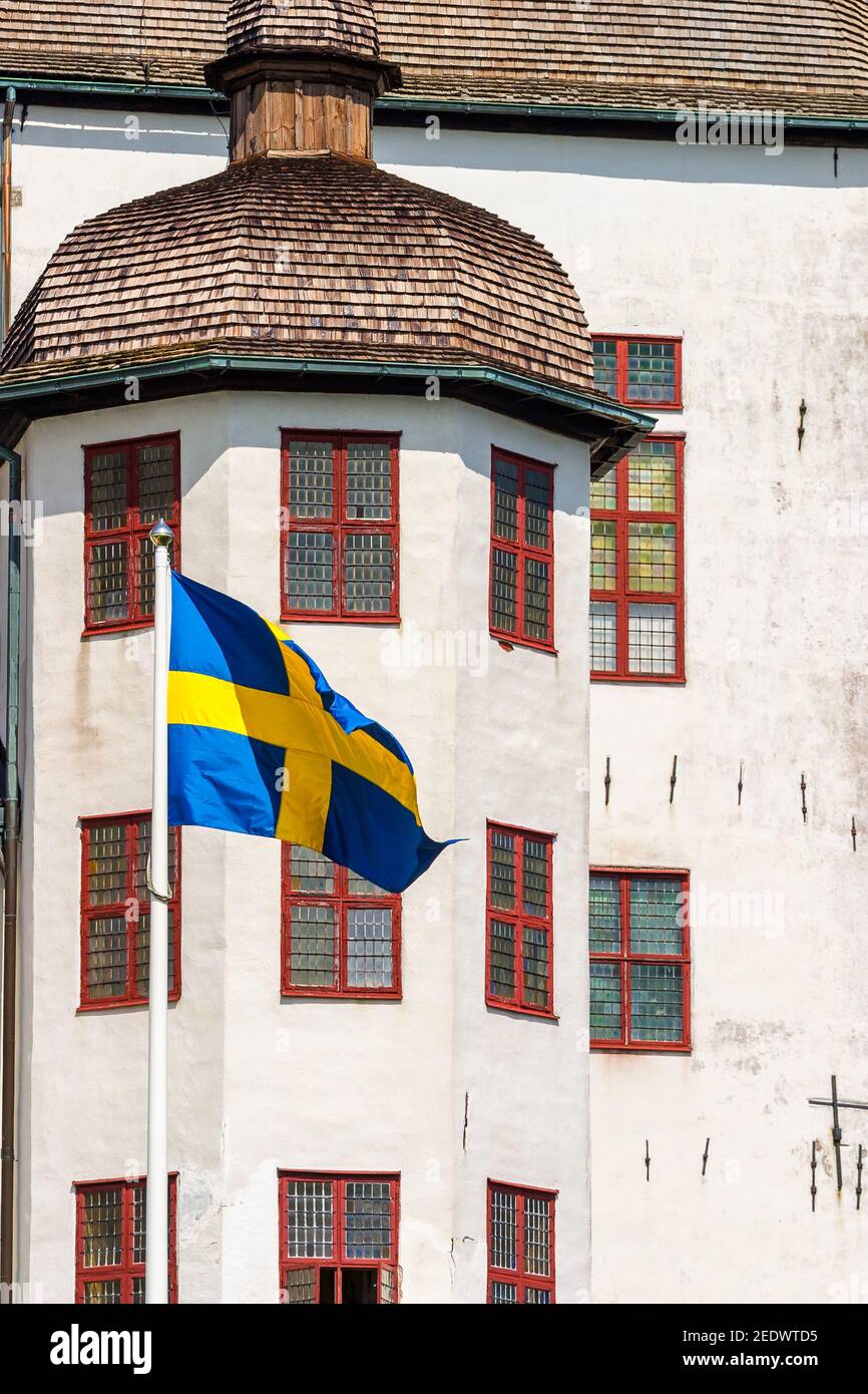 Old castle with the Swedish flag at a tower Stock Photo - Alamy