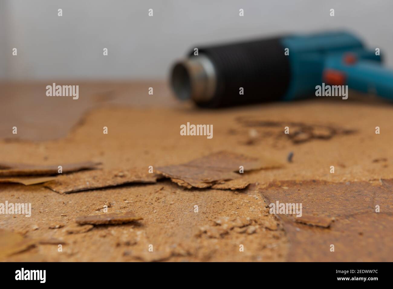 Partially scraped off old surface of furniture during restoration with ...