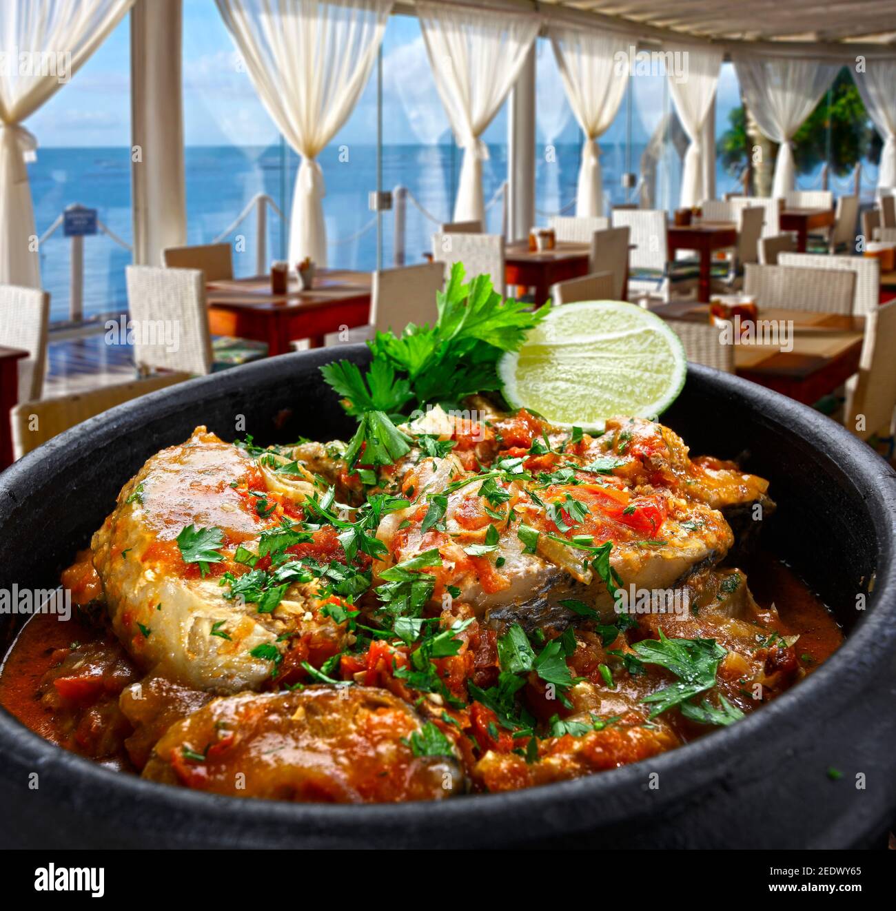 Brazilian shrimp and fish moqueca Stock Photo - Alamy