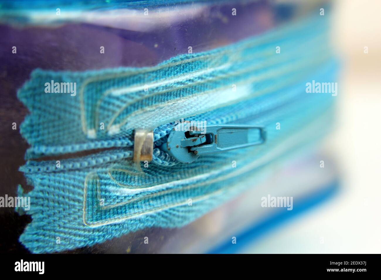 Blue zipper hi-res stock photography and images - Alamy