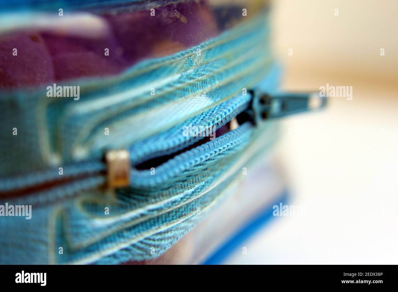 Blue zipper hi-res stock photography and images - Alamy