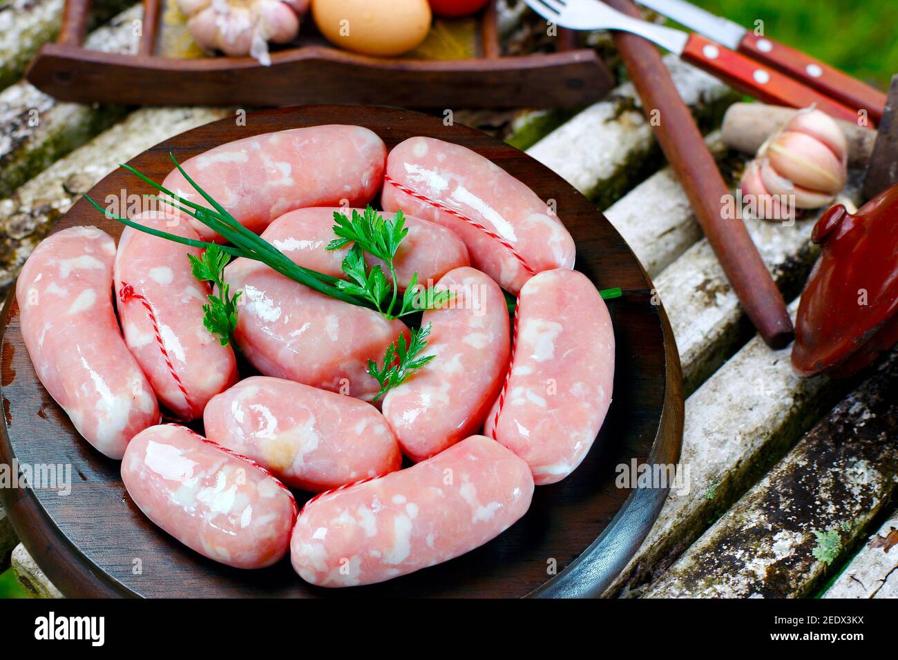 Fresh raw sausage Stock Photo - Alamy
