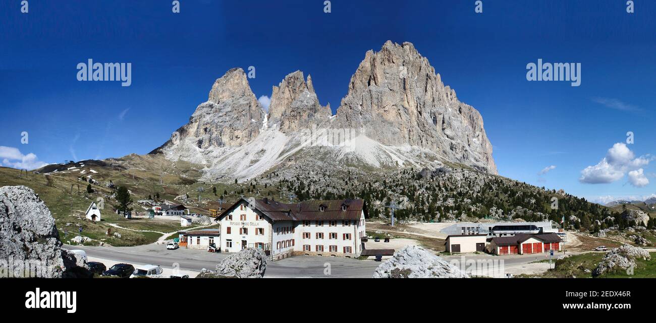 Refuge at the Sella Pass, blue sky, panoramic scene Stock Photo - Alamy