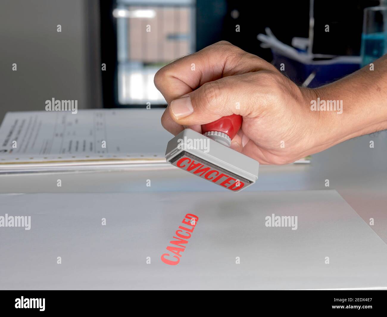 Stamp the word CANCLED on the empty white paper Stock Photo - Alamy