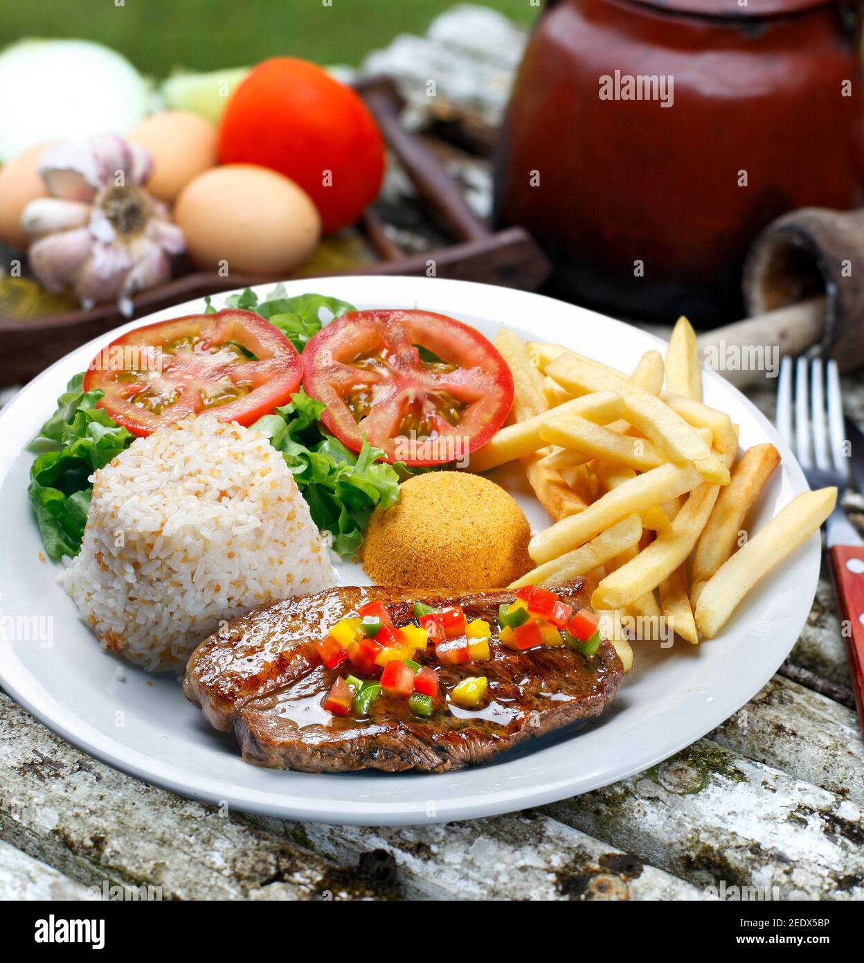 Rice with potatoes and meat Stock Photo - Alamy