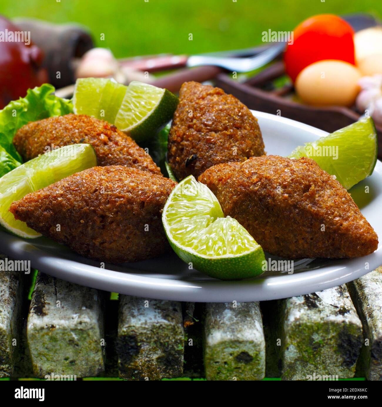 Fried kibble with lemon, Quibe Stock Photo - Alamy