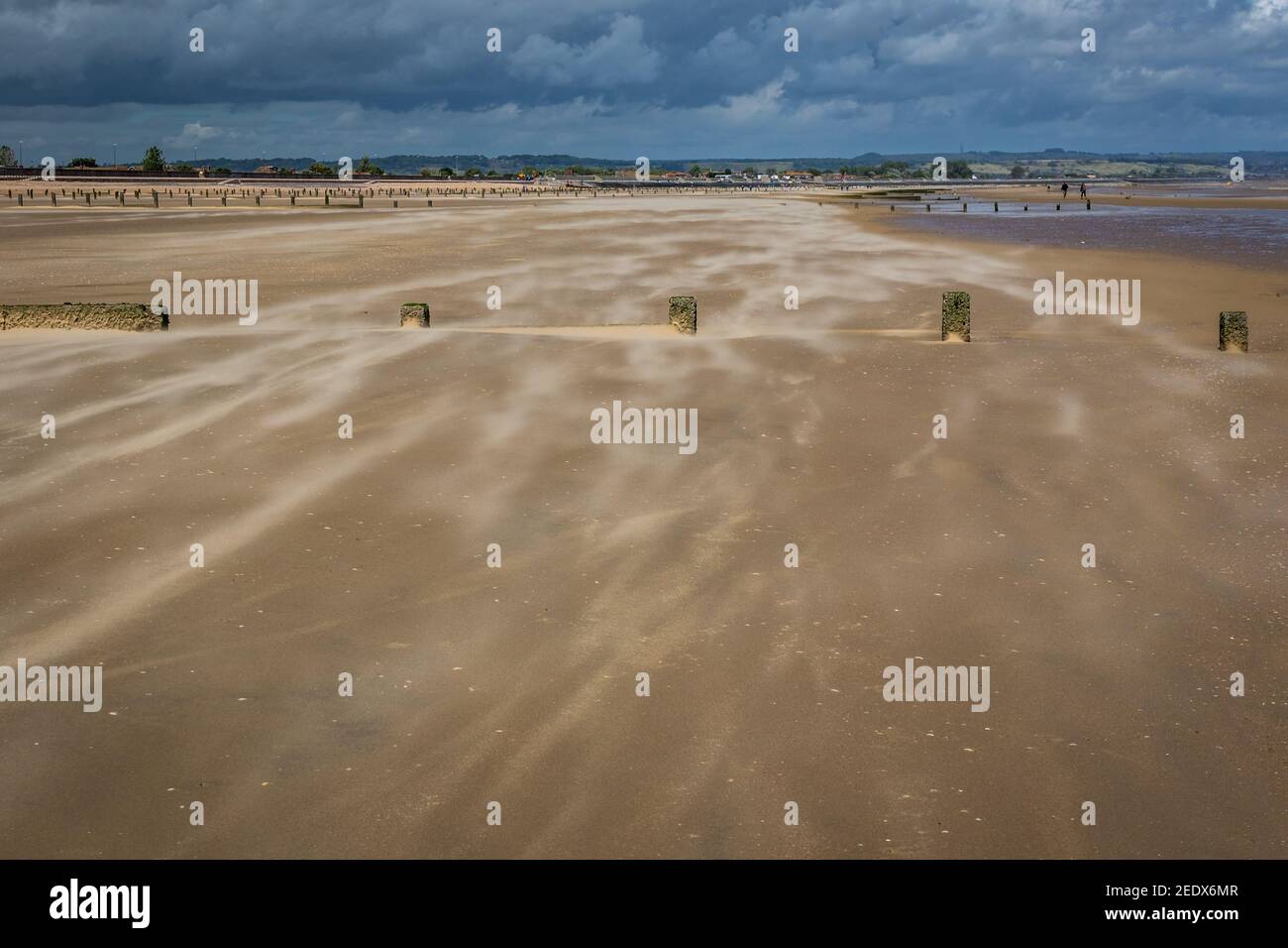 Sandstorm on a deserted beach at Dymchurch, Kent, England Stock Photo ...