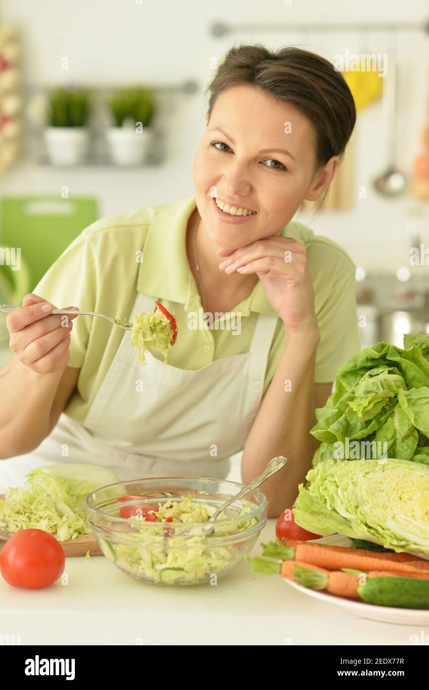 Beautiful model woman cooking hi-res stock photography and images - Alamy