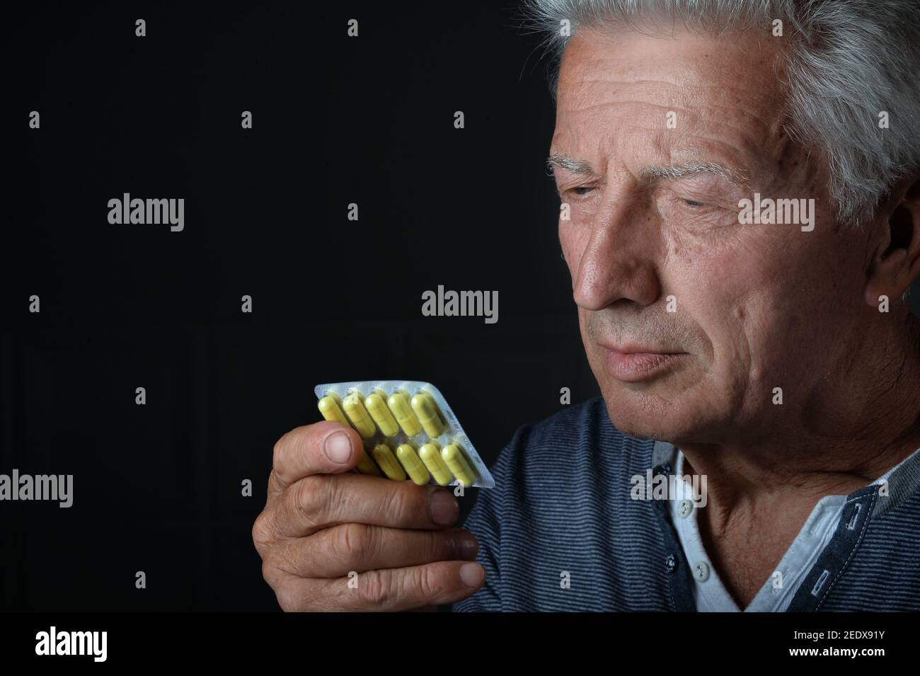 Portrait of a sad sick senior man Stock Photo - Alamy