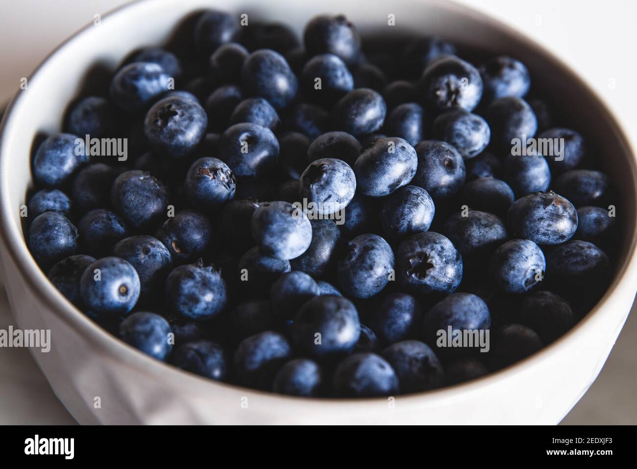 Blueberries in bowl isolated on white background. Healthy food, health ...