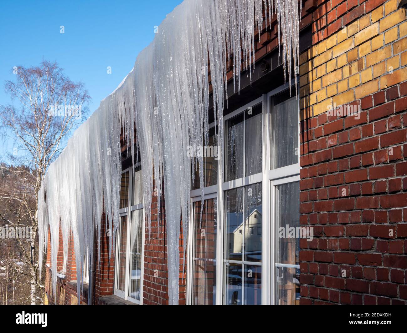 Huge icicles hang from hi-res stock photography and images - Alamy