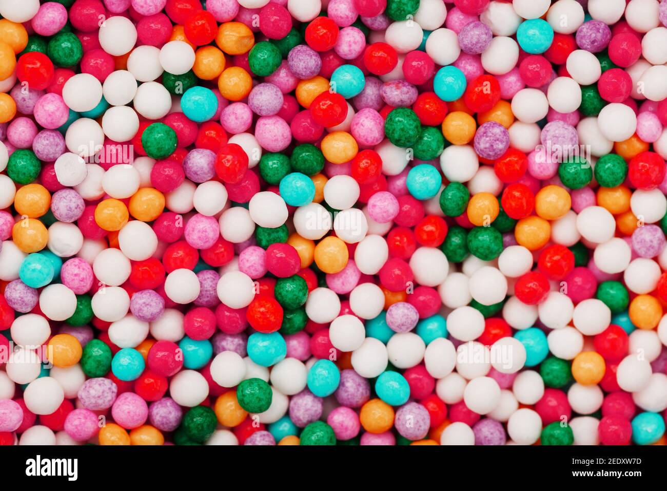Colored balls texture as a background in full screen. Bright substrate ...