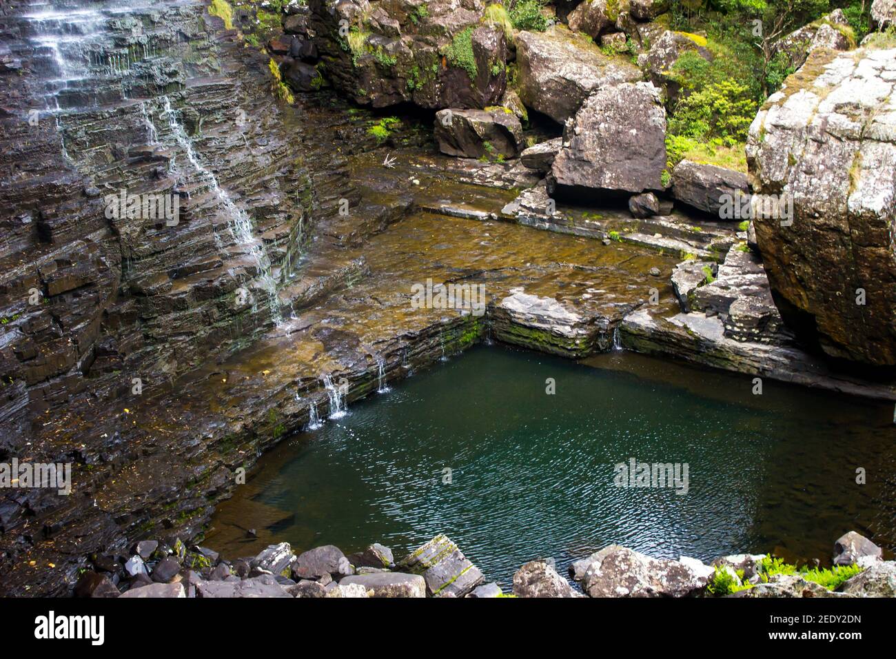Looking down at the foot of the Motisi Waterfall were the water cascade ...