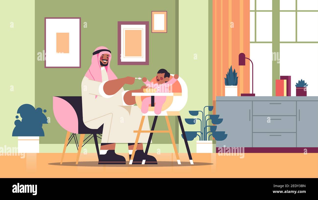 arab father feeding his little son on kids eating chair fatherhood ...
