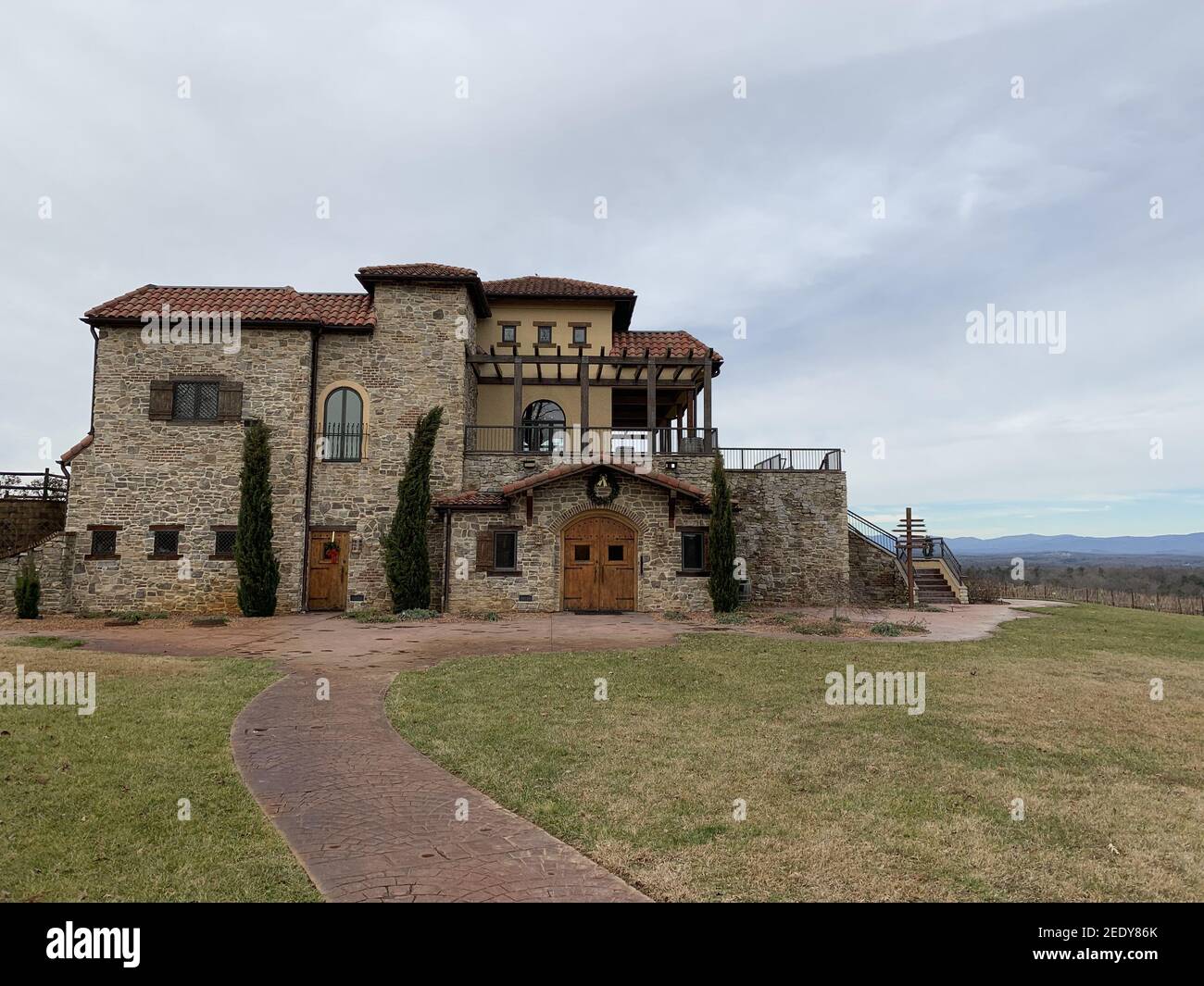 Pathway to a luxurious winery building with Mediterranean style and ...