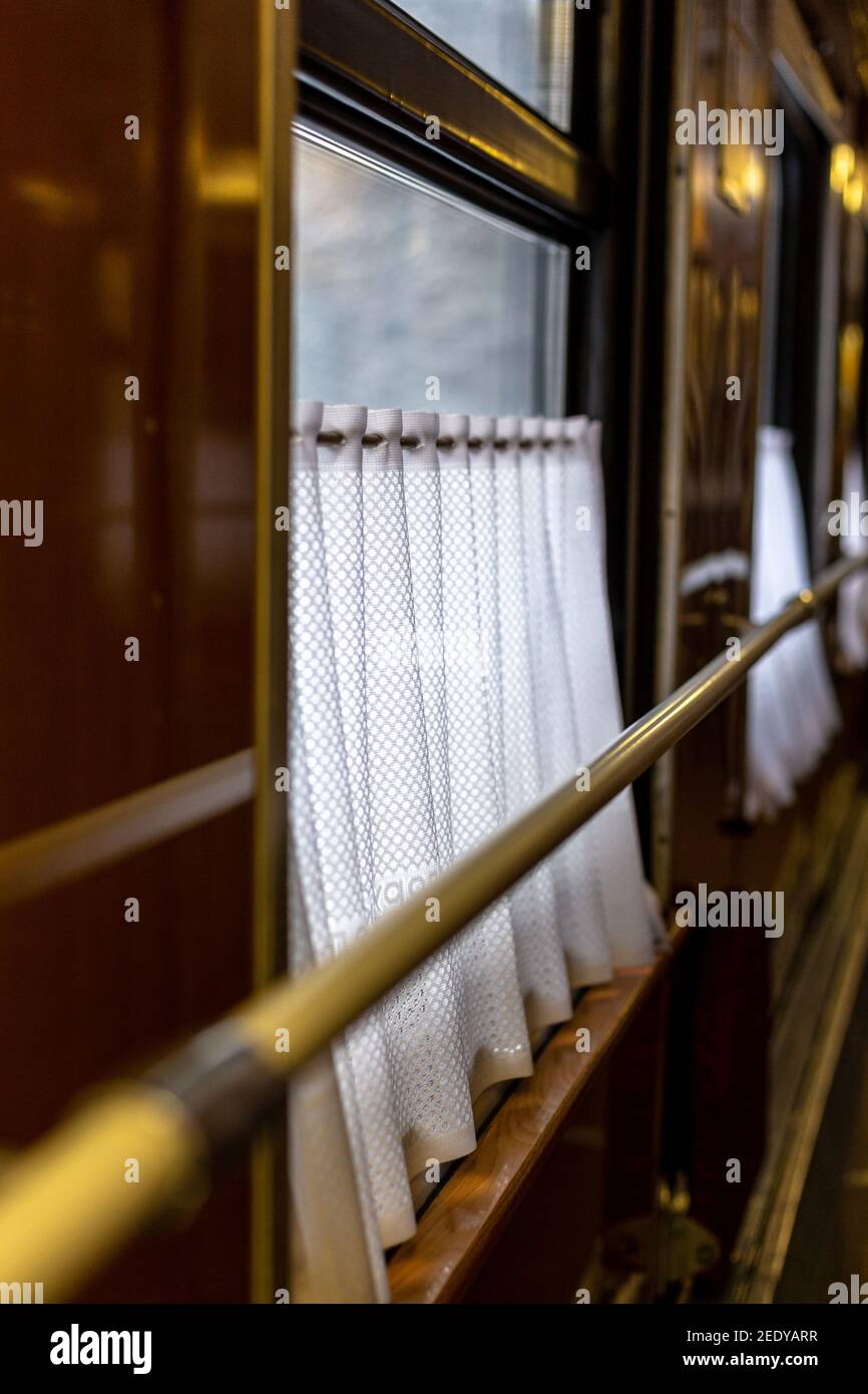 Lace curtains on the window in the train carriage Stock Photo - Alamy