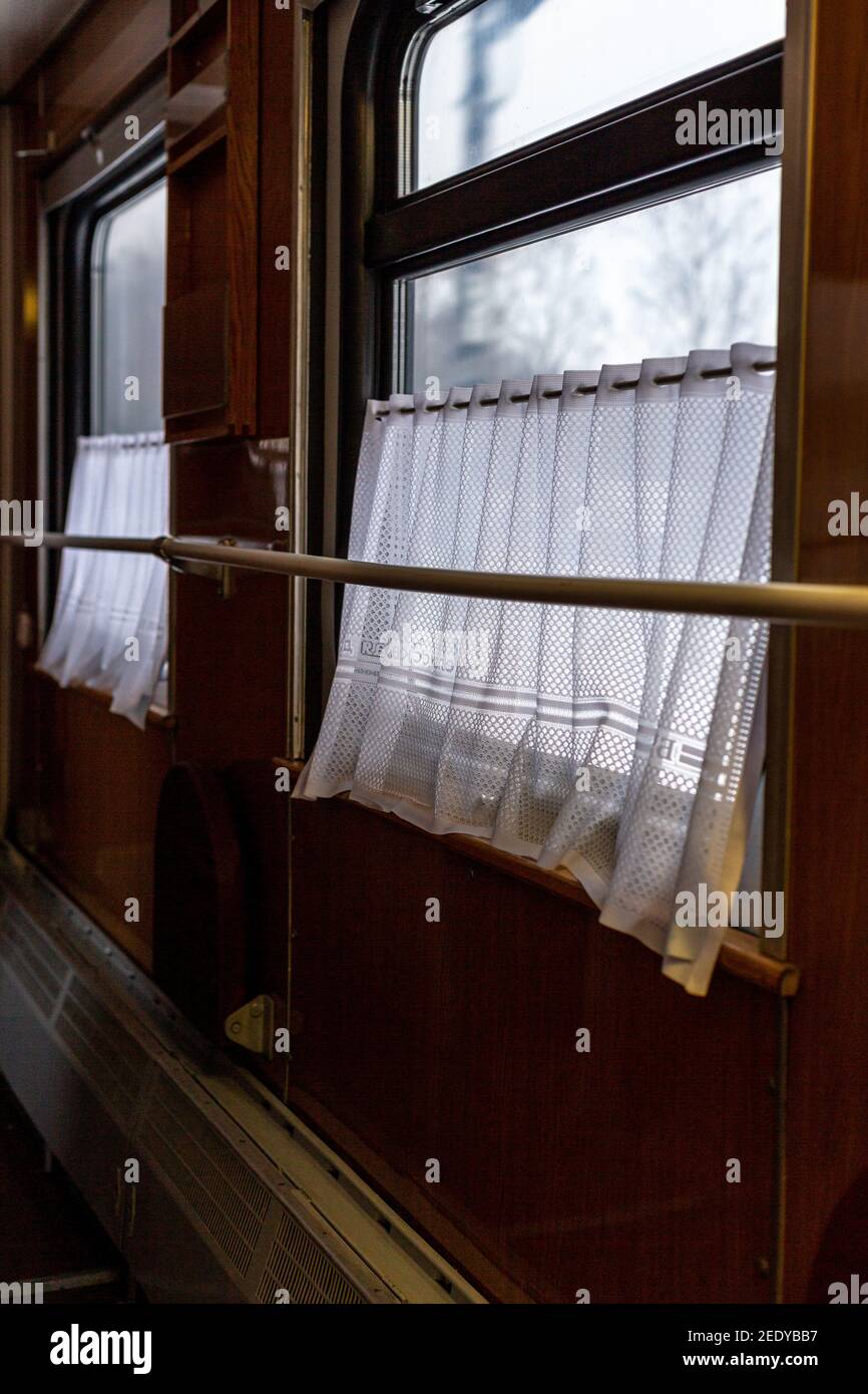 Lace curtains on the window in the train carriage Stock Photo - Alamy