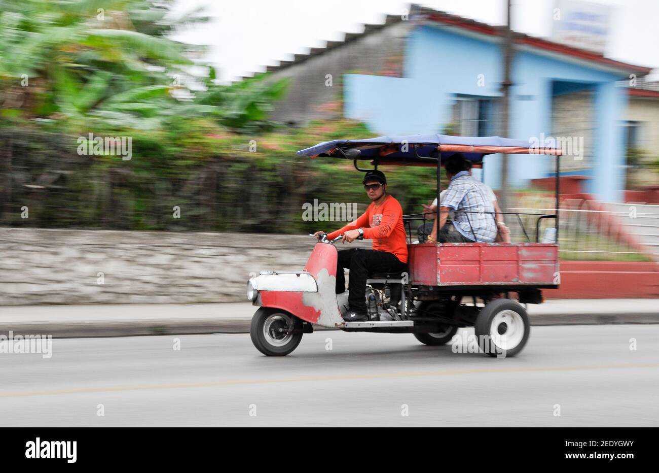 Tuk-tuk is a motorised three-wheel taxi in the streets of cuba ,An auto ...
