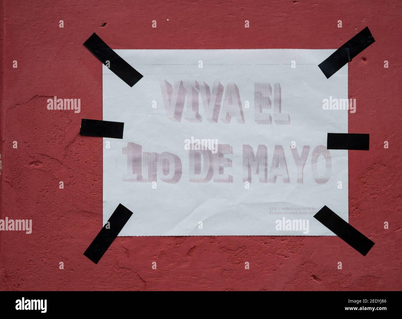Cuban Socialist slogans viva el de 1 mayo printed on paper and pasted ...