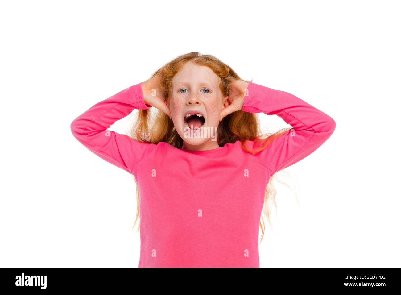 Shouting, screaming. Happy, smiley redhair girl isolated on white ...