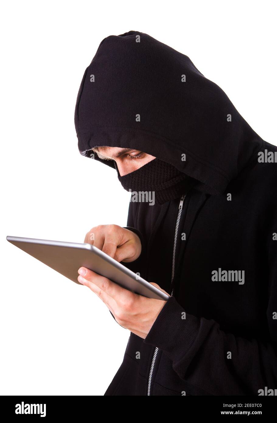 Hacker with a Tablet Computer on the White Background Stock Photo - Alamy
