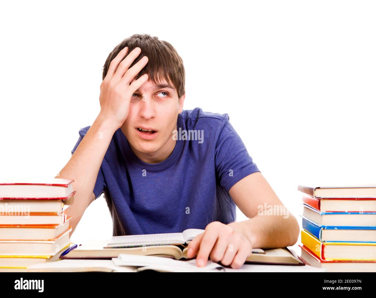 Tired and Troubled Student at the Writing Table on the White Background ...