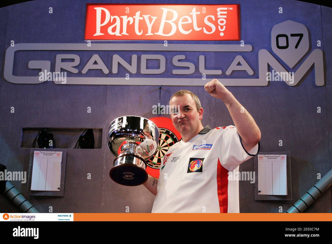 Phil taylor celebrates with the trophy hi-res stock photography and ...