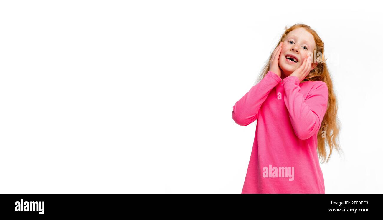 Contented, shocked. Happy, smiley redhair girl isolated on white studio ...