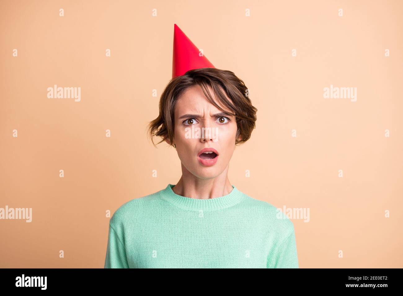 Photo of young woman astonished shocked displeased dislike surprise ...