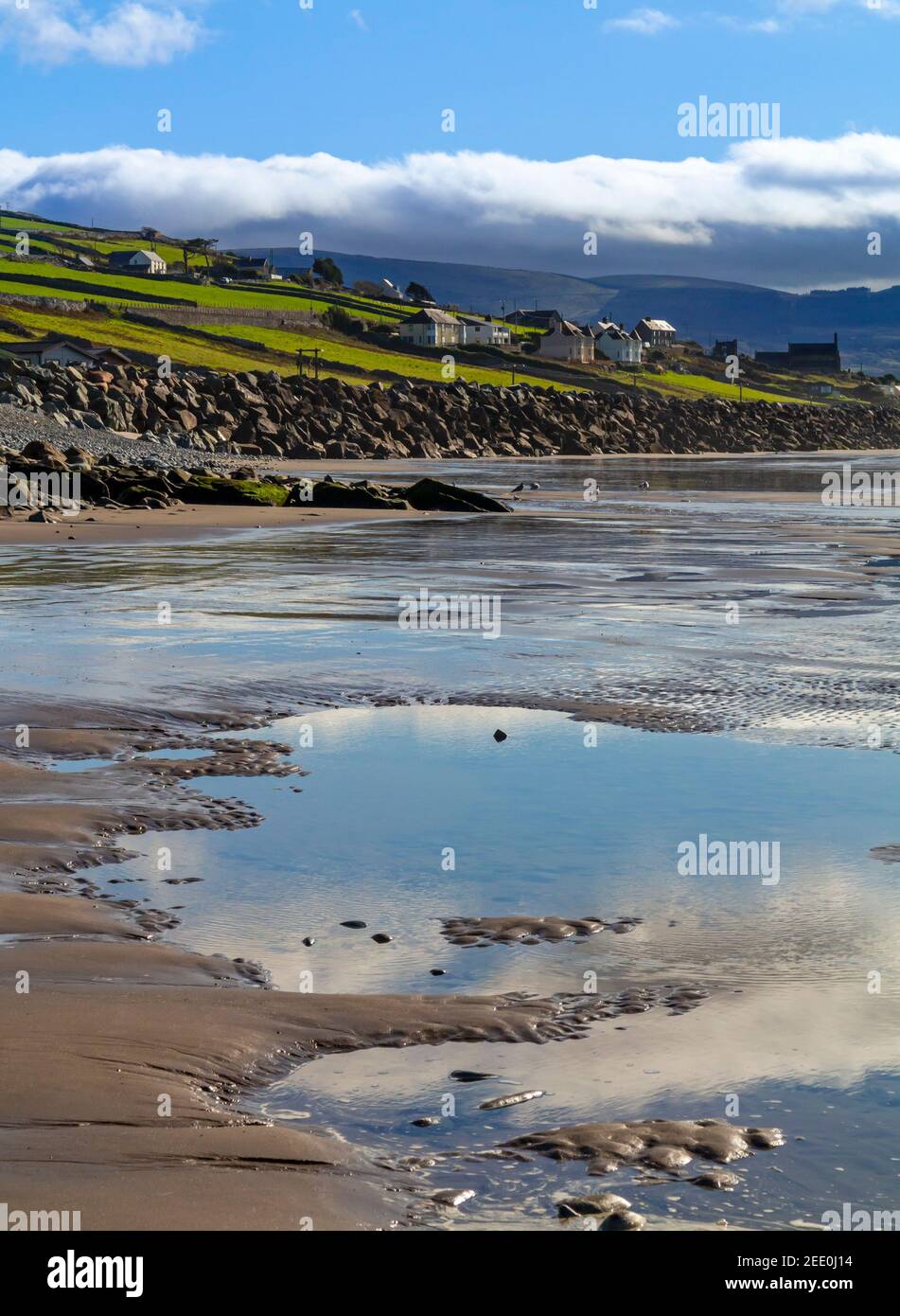 The sandy beach at Barmouth Bay or Abermaw in Gwynedd on the north west ...