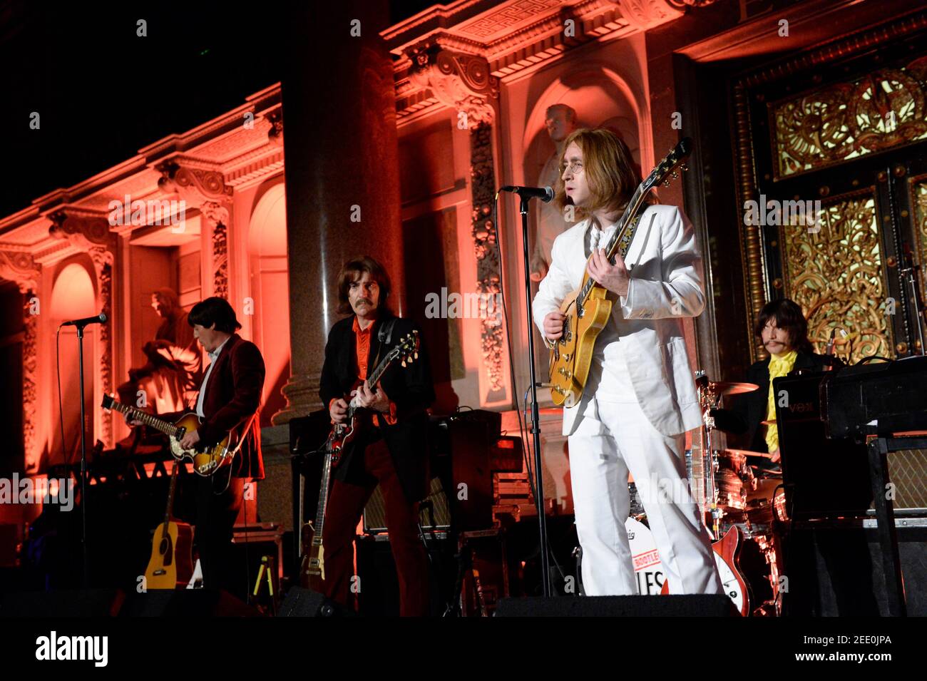 Performing live at St Georges Hall, Liverpool, The Bootleg Beatles are ...