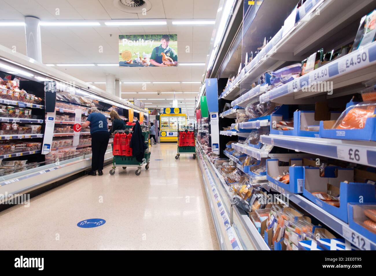 Tesco supermarket aisle shelves hi-res stock photography and images - Alamy