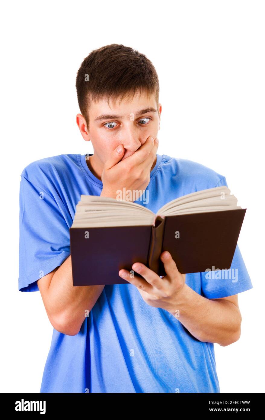 Surprised Young Man read a Book Isolated on the White Background Stock ...