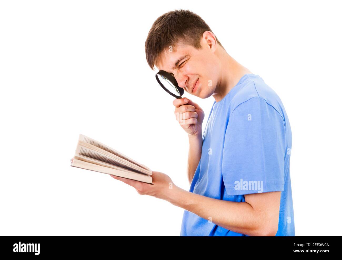Young Man with a Book and Magnifying Glass on the White Background ...