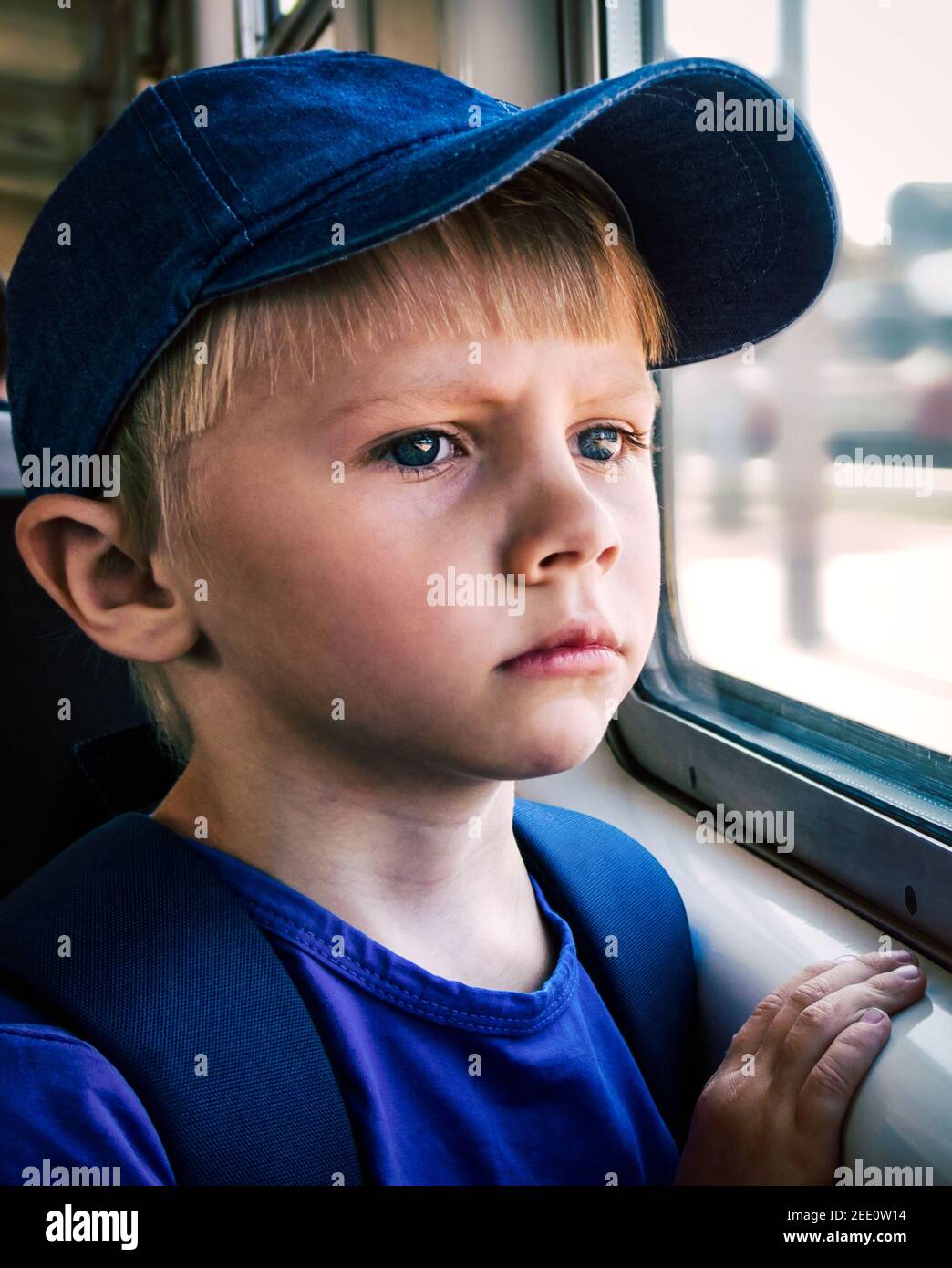 Sad Child Boy sit in the Train by the Window Stock Photo - Alamy