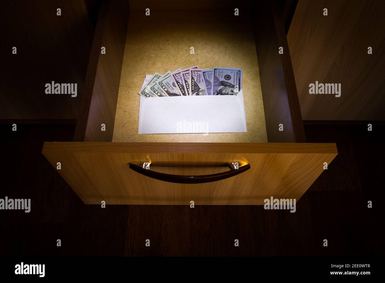 Envelope with a Money in the Drawer of the Furniture Stock Photo - Alamy